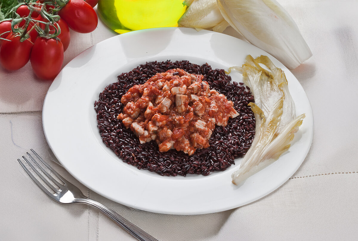 Riso nero al ragù di pesce | Educazione Nutrizionale Grana Padano